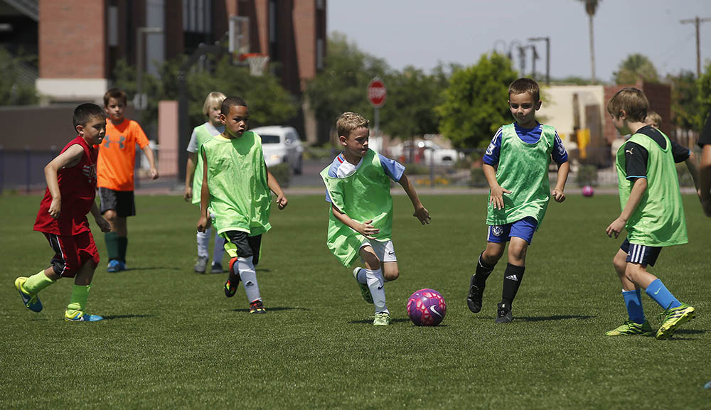 Foster children play like kids at GCU soccer camp - GCU News